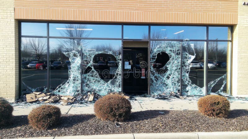 Damaged Glass Window or Door at Store, Office, or Residence a Visual ...