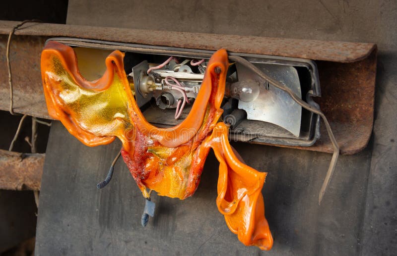 Damaged and Melted Vehicle Taillight, Distorted Plastic Indicates ...