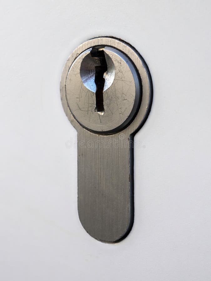 Damaged Metal Cylinder Lock at a White Door Stock Photo - Image of ...