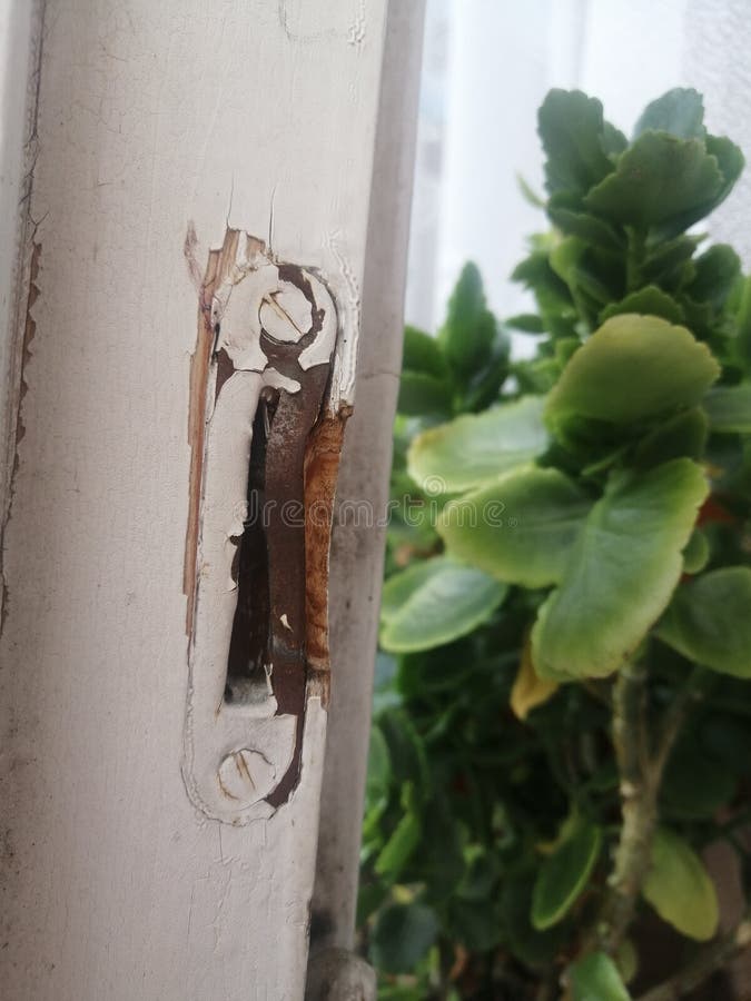 Damaged Old Rusty Handle by the Window Stock Photo - Image of cobwebs ...