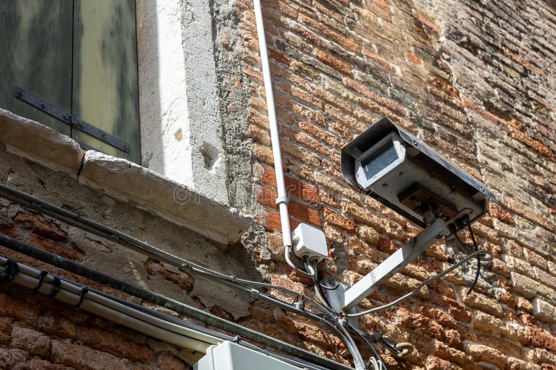 Damaged Old Surveillance Camera on Brick Wall Stock Image - Image of ...