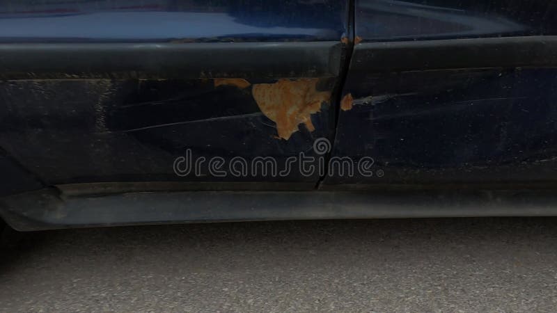 Damaged Paint on the Car after a Small Collision and Rust Formation on ...