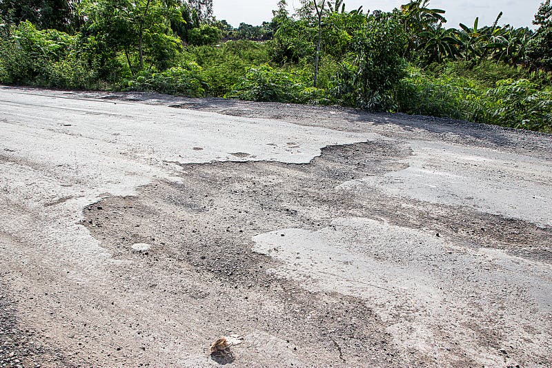 Damaged Road in the Countryside Stock Photo - Image of broken, dirt ...