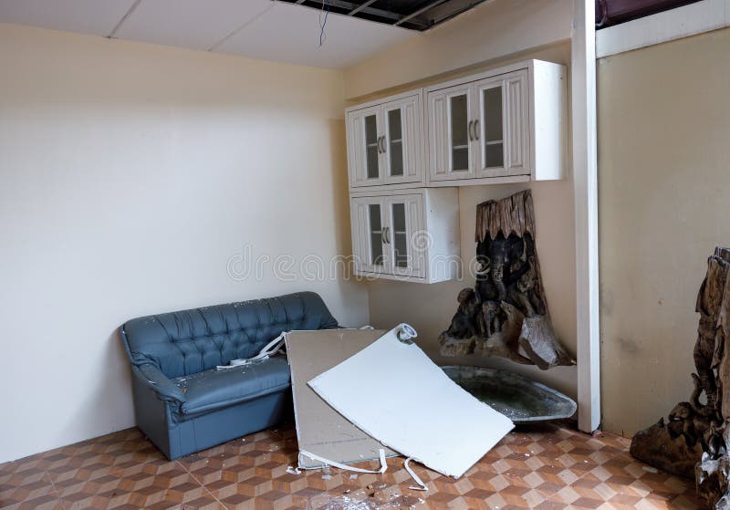A Damaged Room with a Broken Section of Ceiling Stock Photo - Image of ...