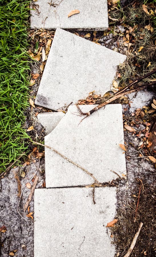 Broken Cement Sidewalk Slabs on a Path. Stock Photo - Image of decay ...