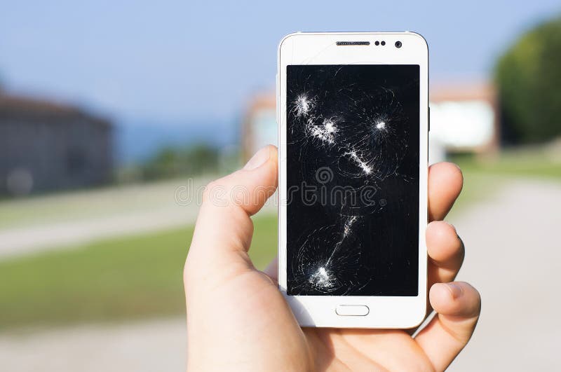 Damaged Smartphone Display stock image. Image of hand - 121377635