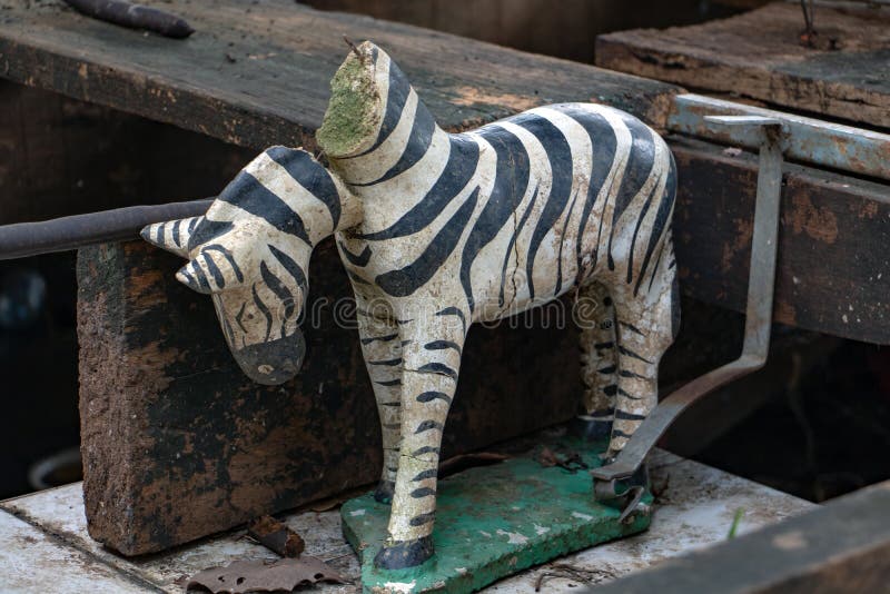 The Damaged Statue of Zebra with a Falling Head Stock Photo - Image of ...