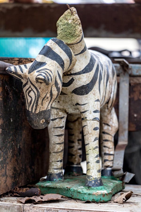 The Damaged Statue of Zebra with a Falling Head Stock Photo - Image of ...