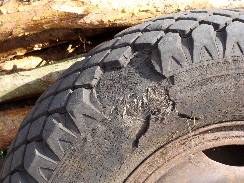 Damaged car tire stock photo. Image of surface, performance - 187176402