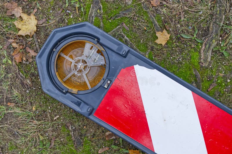 Damaged Traffic Warning Sign on Ground Stock Image - Image of trip ...