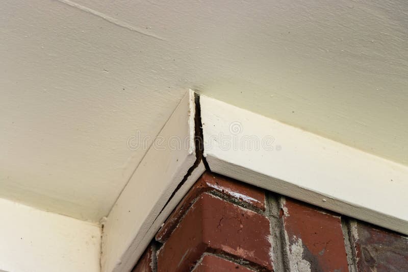 Damaged Trim on the Corner of a Brick House Stock Photo - Image of ...