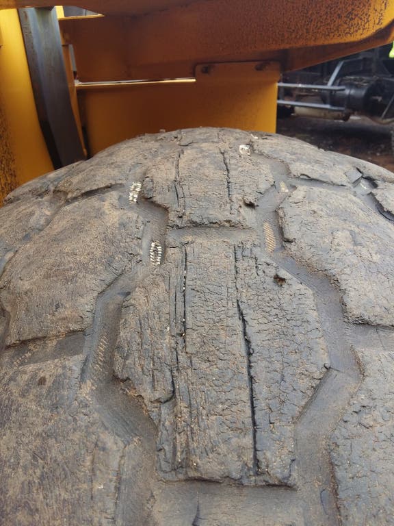 Damaged tyre shown threads stock image. Image of tyre - 261805941