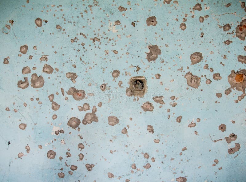 Bullet Damaged Wall Stock Photos - Download 207 Royalty Free Photos