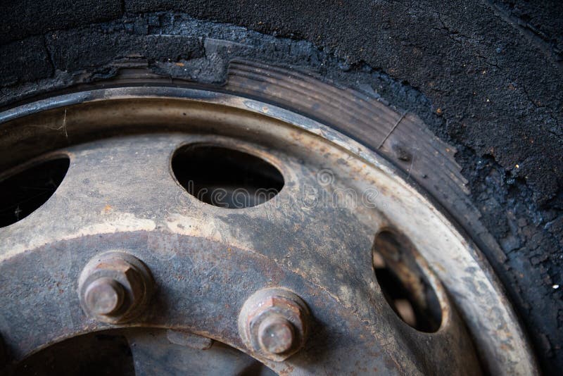 Wheel of Burned Car. Burnt Flat Tire on the Car is on the Gray Asphalt ...