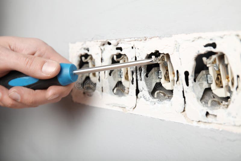 Damaged Wires in Electrical Outlet in Wall. Violation of Electrical ...