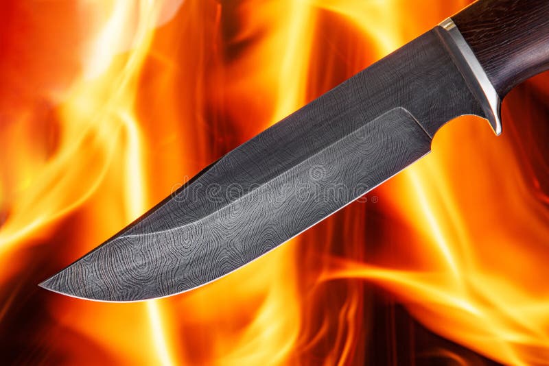Damascus Steel Knife on the Fire Background. Stock Image - Image of ...
