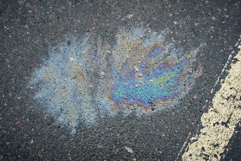 Damp Surface in a Parking Spot, Showing a Fuel Leak from a Car ...