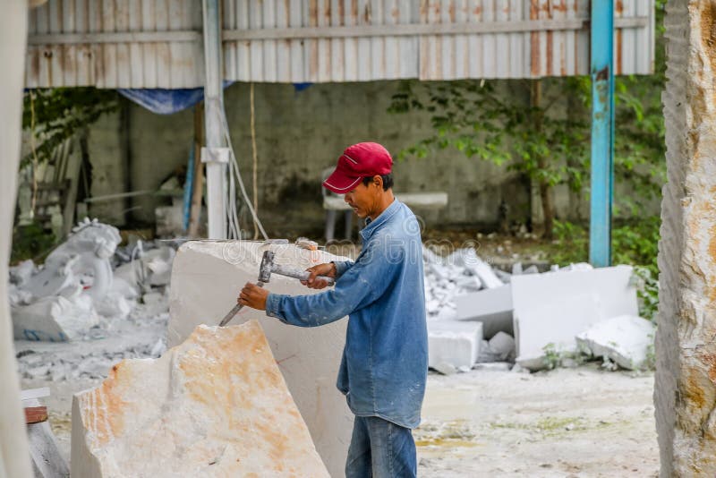A Worker Carving a Marble Statue at a Shop in Danang, Vietnam Editorial ...