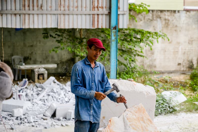 A Worker Carving a Marble Statue at a Shop in Danang, Vietnam Editorial ...