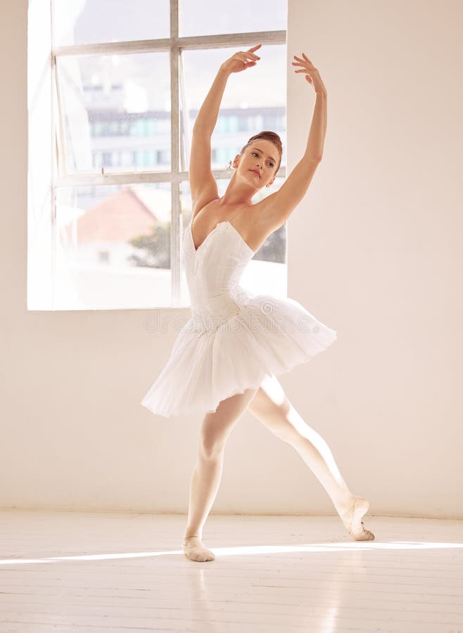 Dance, Ballet and Studio with a Woman Dancer Training, Practicing or ...