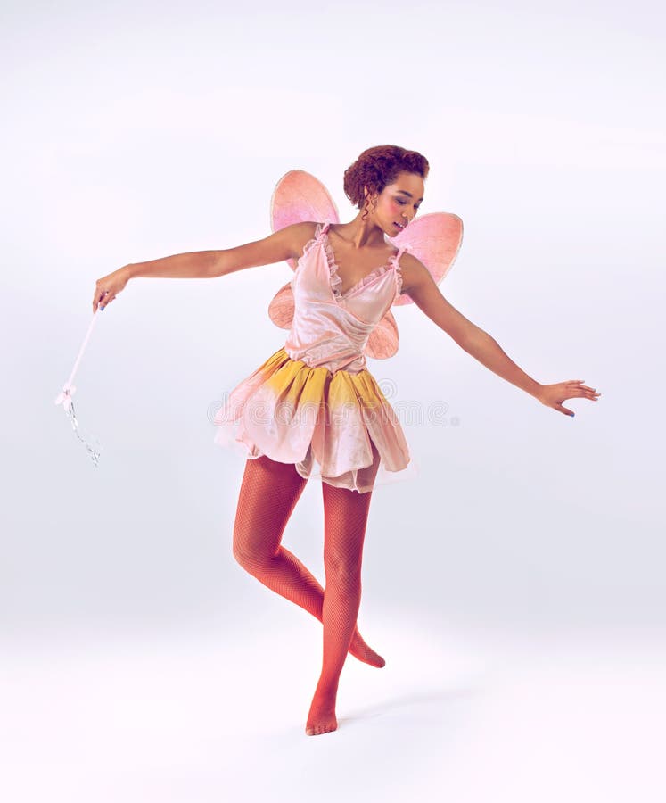 Dance of the Fairy. a Full Length Shot of a Cute Fairy Dancing. Stock ...
