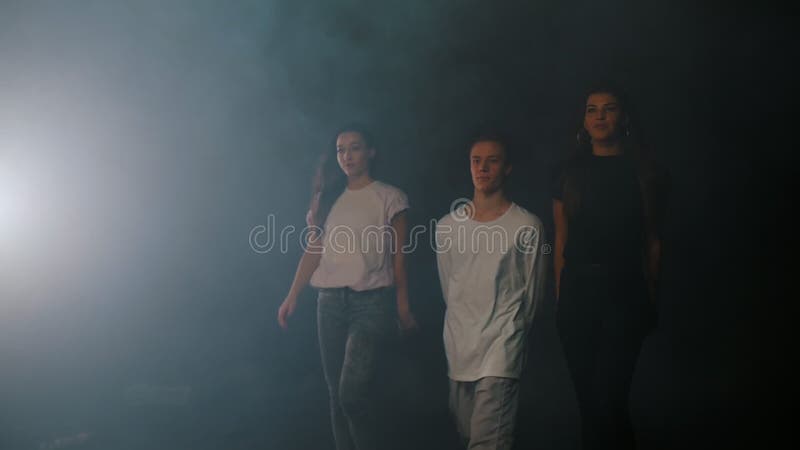 Dance Group of Three People Walking Out on Stage Stock Video - Video of ...