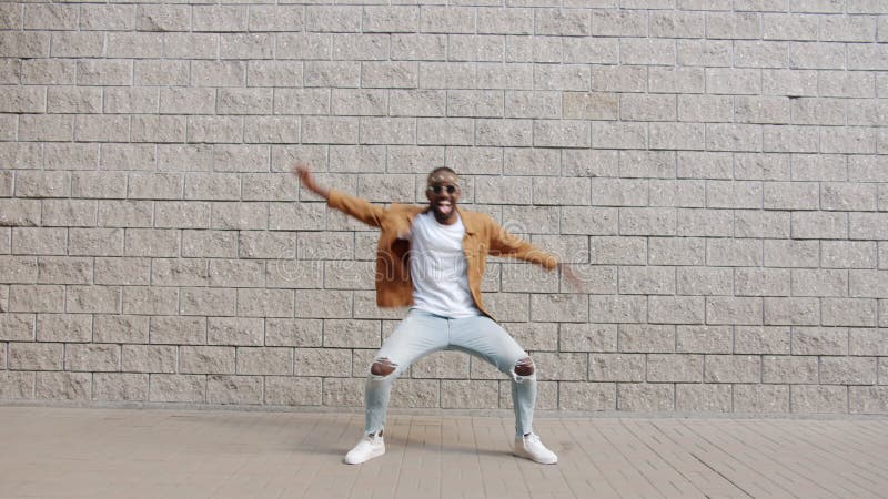 Dance Loop of Active African American Man Making Wave Movements with ...