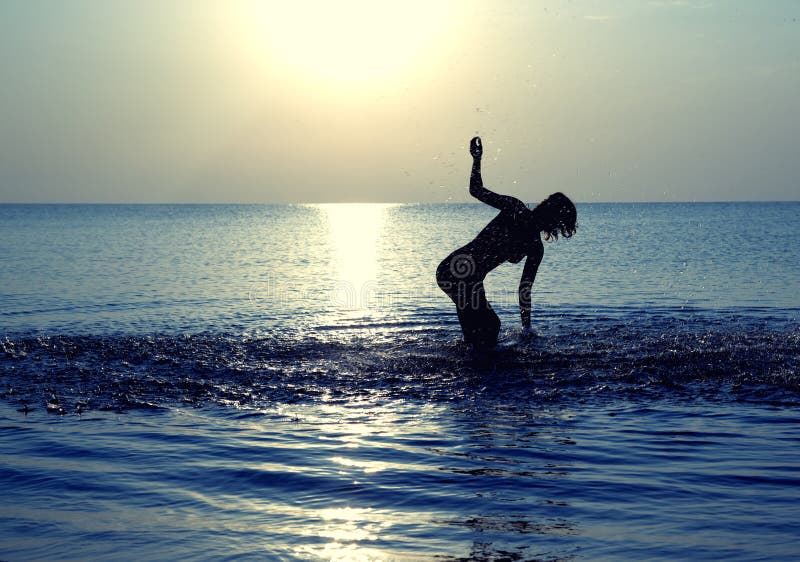 Dance in the sea stock photo. Image of girl, leisure - 25951256