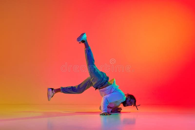 Dance Show. Dynamic Image of Young Guy Dancing Breakdance Against ...