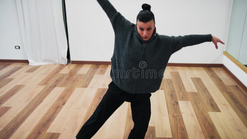 Dance Teacher Exercises Mind Concentration with Slow Rhythmic Movements ...