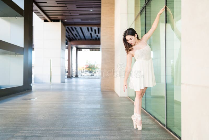 Ballerina Practicing Some Dance Moves Stock Image - Image of crouching ...