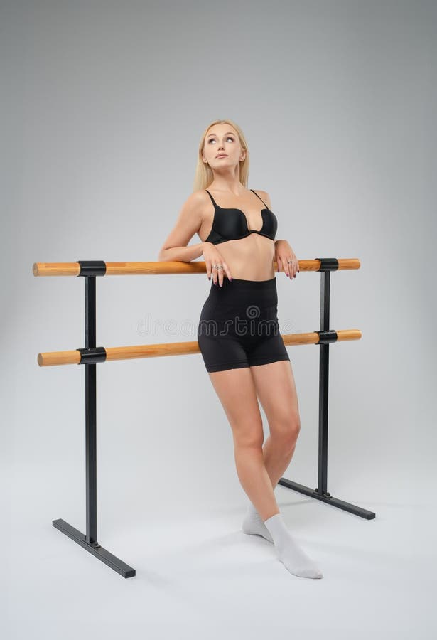 Dancer Practicing at the Ballet Barre in a Studio Setting during Daytime Stock Photo - Image of ...