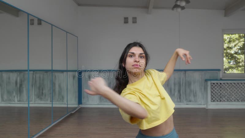 Dancer Performs Gentle, Flowing Arm Movements with a Focus on Grace and ...