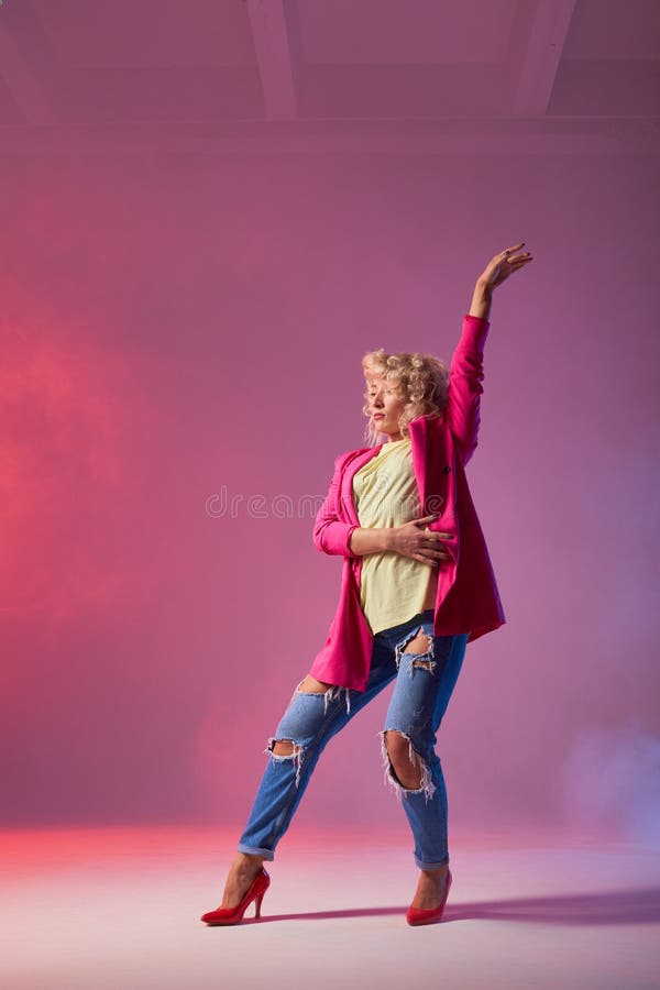 Dancer Poses in Front of Studio Background Stock Image - Image of ...