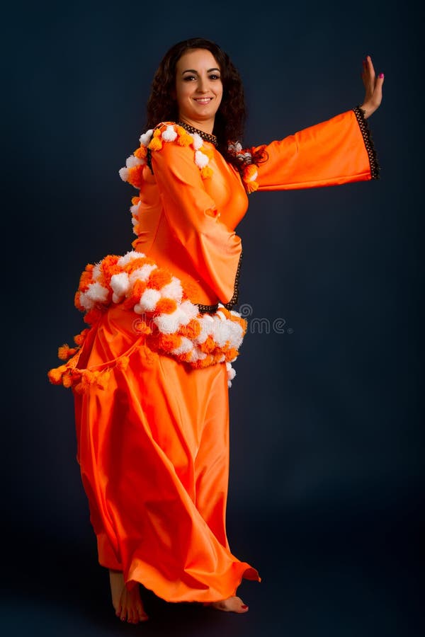 Dancer Posing In Traditional Orange Costume Stock Image - Image of ...