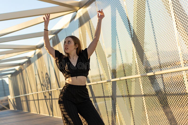 Young Dancer Performing Modern Dance on a Bridge at Sunset Stock Image - Image of beauty, dance ...