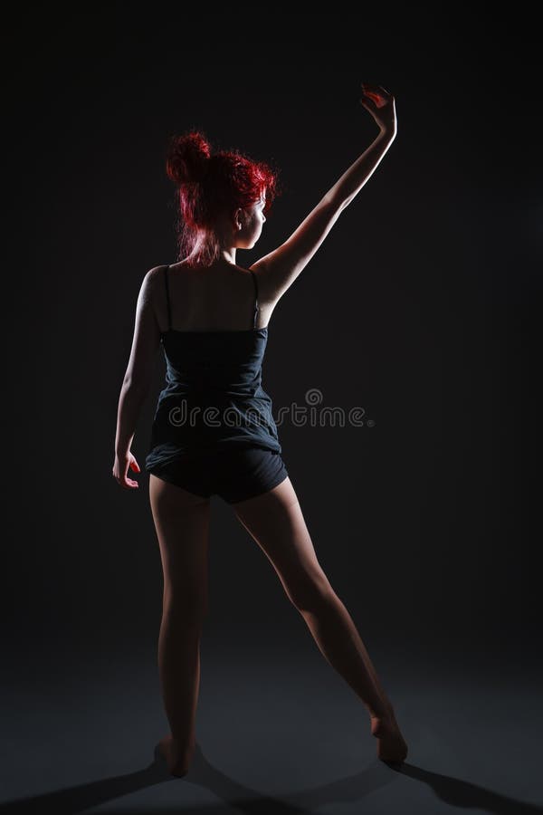 Dancer with Red Hair stock image. Image of shadow, dancer - 50545335