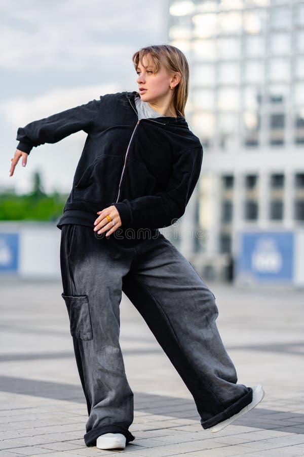 Young Dancer Practices Dynamic Movements in Urban Setting during ...