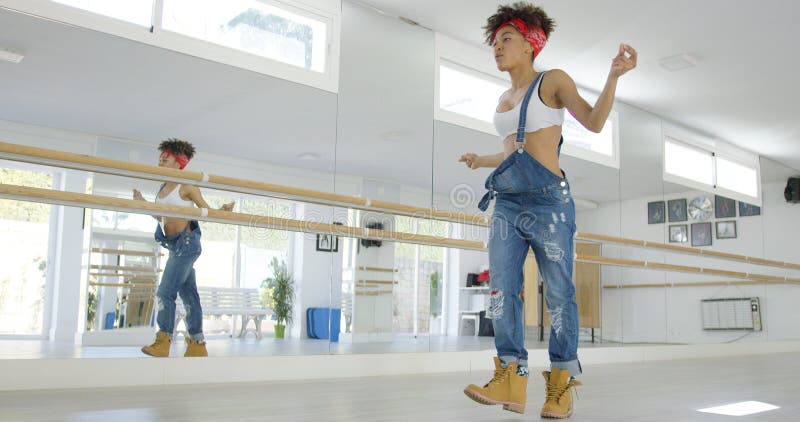 Dancer Steps Forward and Snaps Finger in Studio Stock Photo - Image of ...