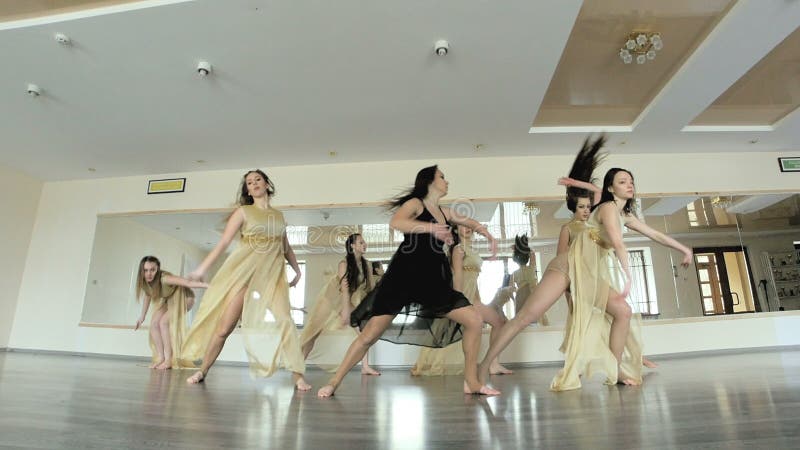 Dancers Performing and Practicing a Contemporary, Modern Form of Dance ...