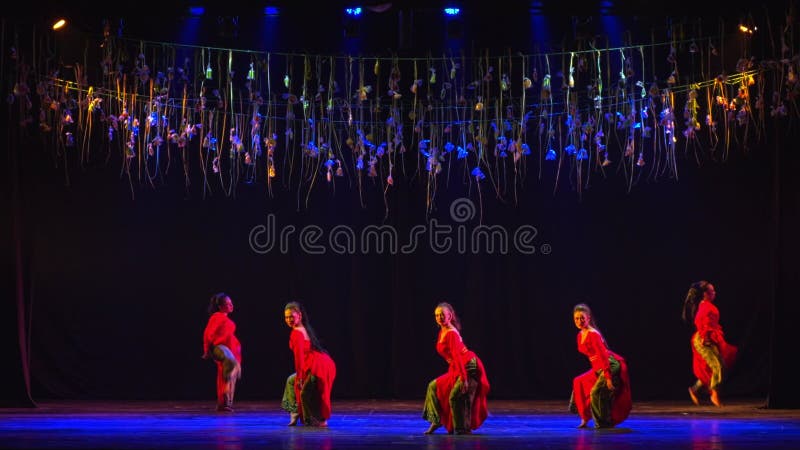 Dancers on Stage Performing a Contemporary Routine with Dramatic ...