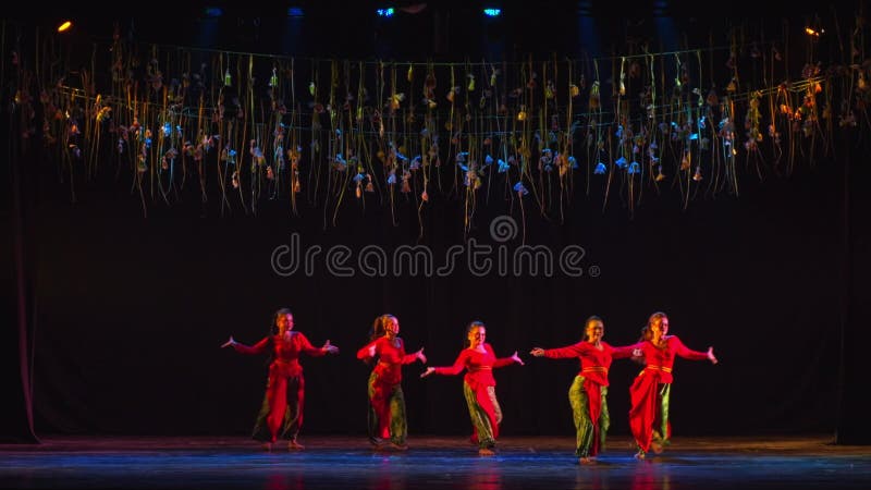 Dancers on Stage Performing a Contemporary Routine with Dramatic ...