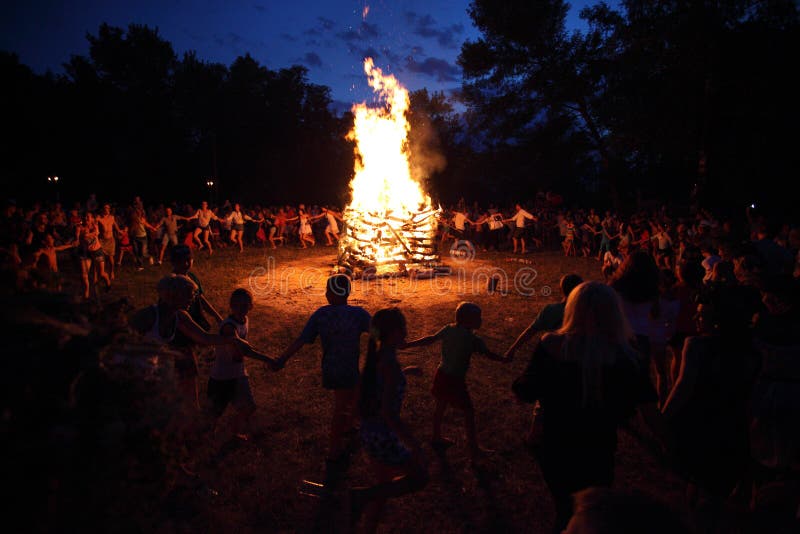 Dancing Around the Campfire Editorial Photography - Image of holding ...
