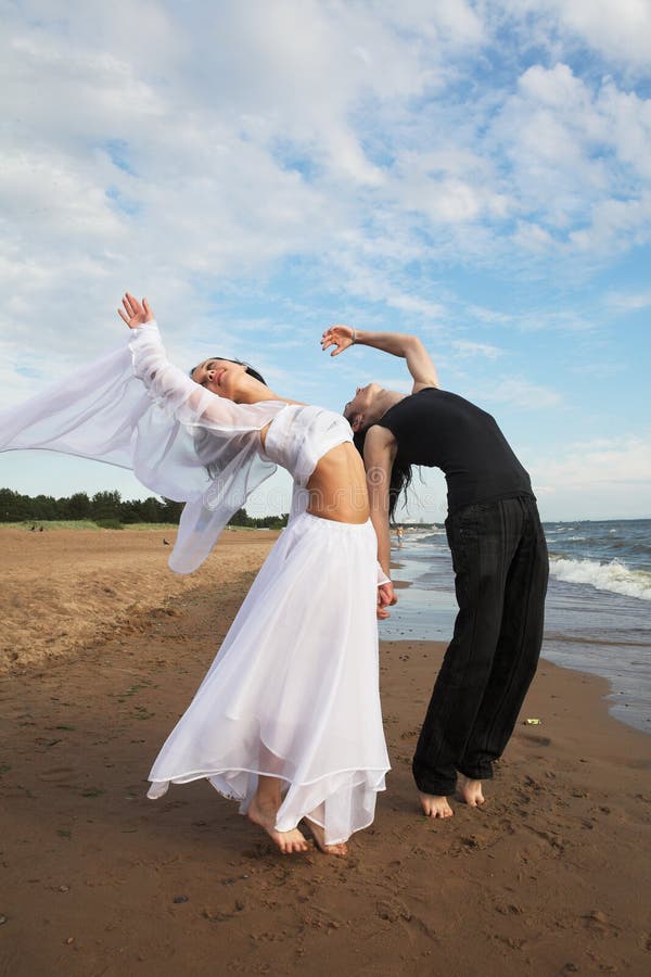 Dancing on the beach stock image. Image of beauty, happiness - 13942525