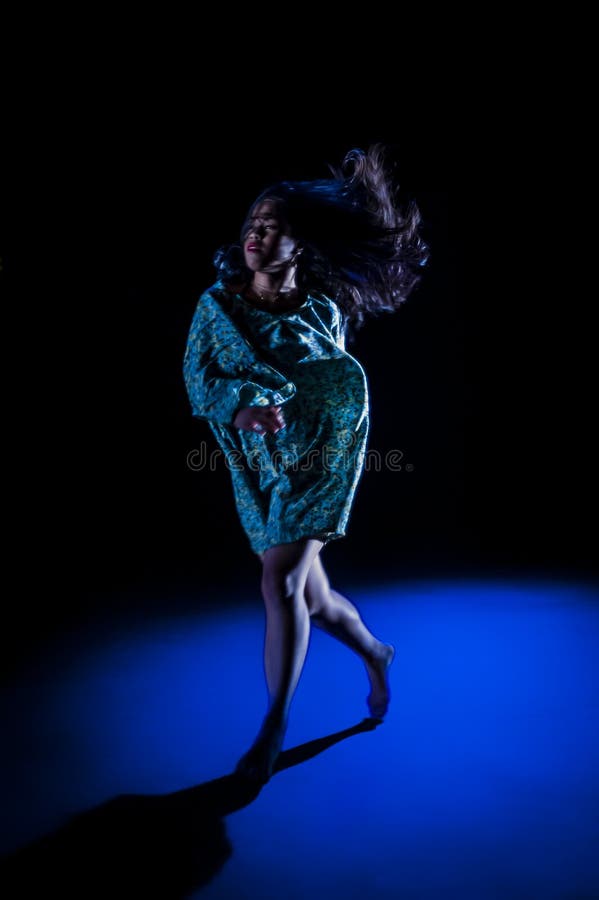 Dancing in dark studio editorial stock image. Image of music - 60567979