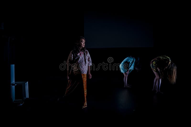 Dancing in dark studio editorial photography. Image of compete - 60568037