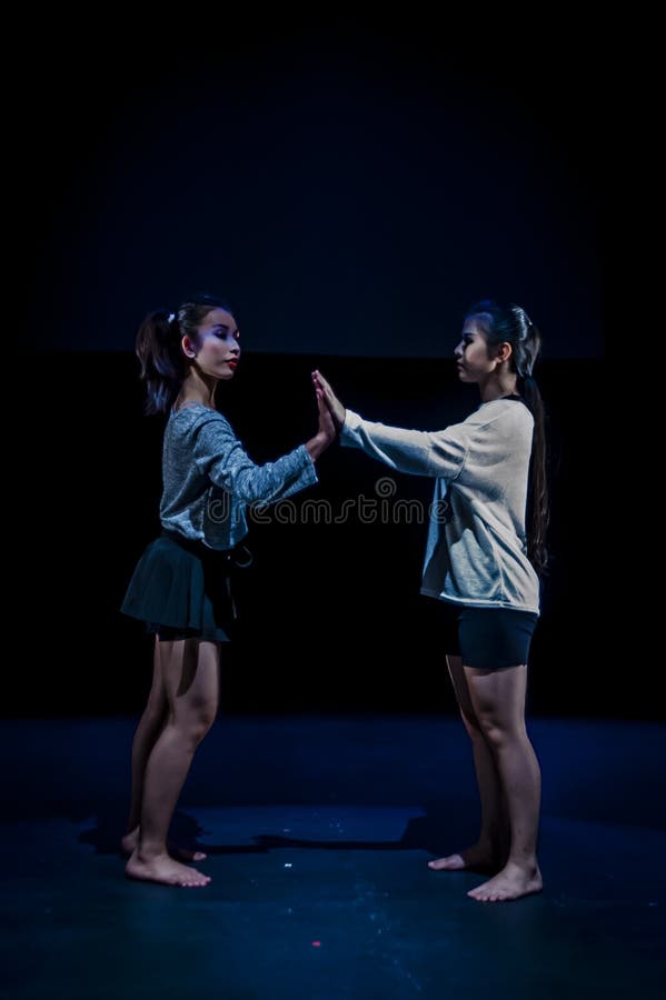 Dancing in dark studio editorial stock photo. Image of arts - 60573938