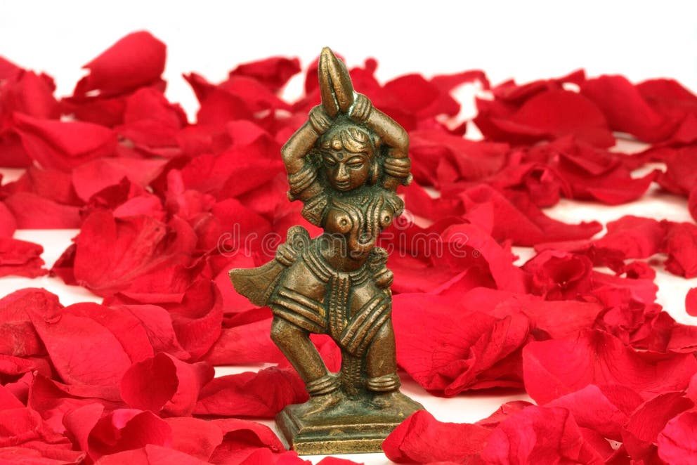 Dancing Devi on a Bed of Red Rose Petals Stock Image - Image of ...
