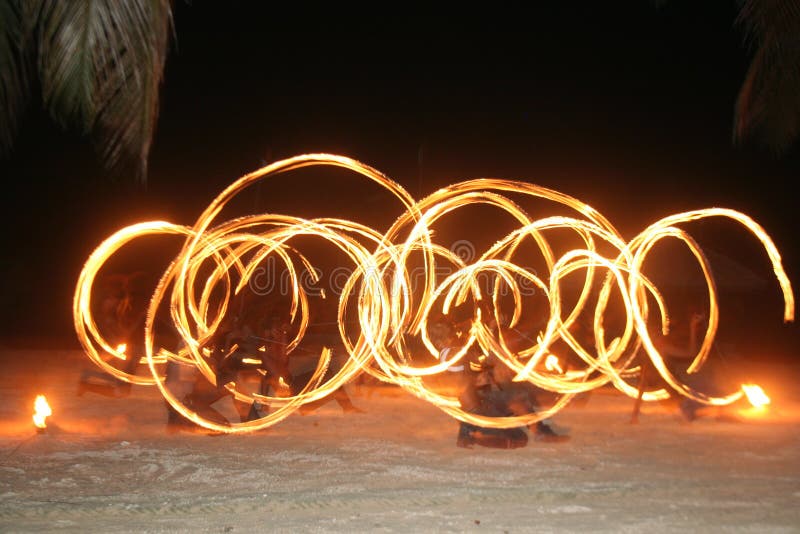 Dancing with fire stock image. Image of sitting, sticks - 64801073