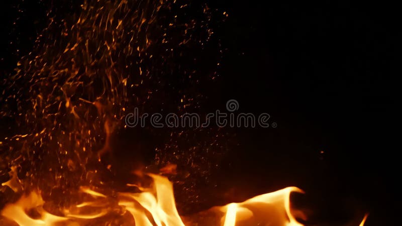 Dancing Flames Create Mesmerizing Patterns Against a Dark Background at ...